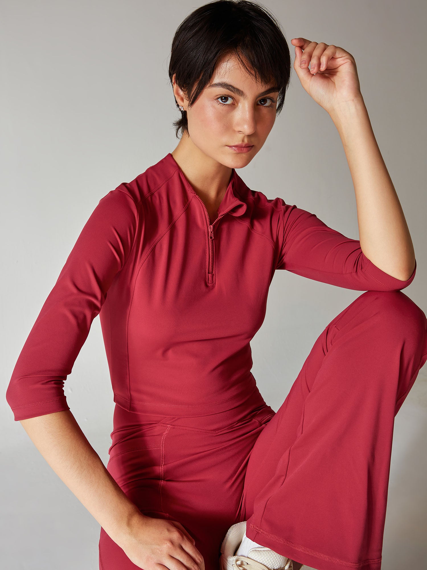 Sienna Red Silhouette Zip Top – CAVA Athleisure Pvt Ltd