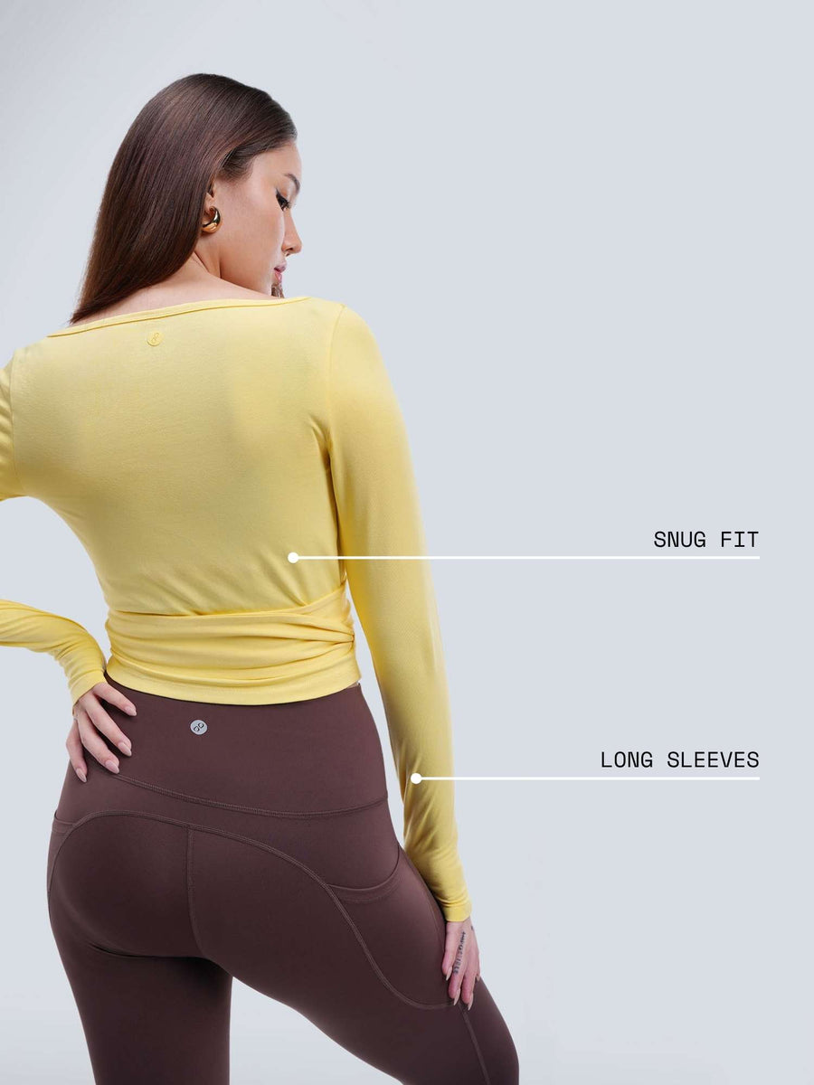 Yellow Cotton Wrap Top – CAVA Athleisure Pvt Ltd