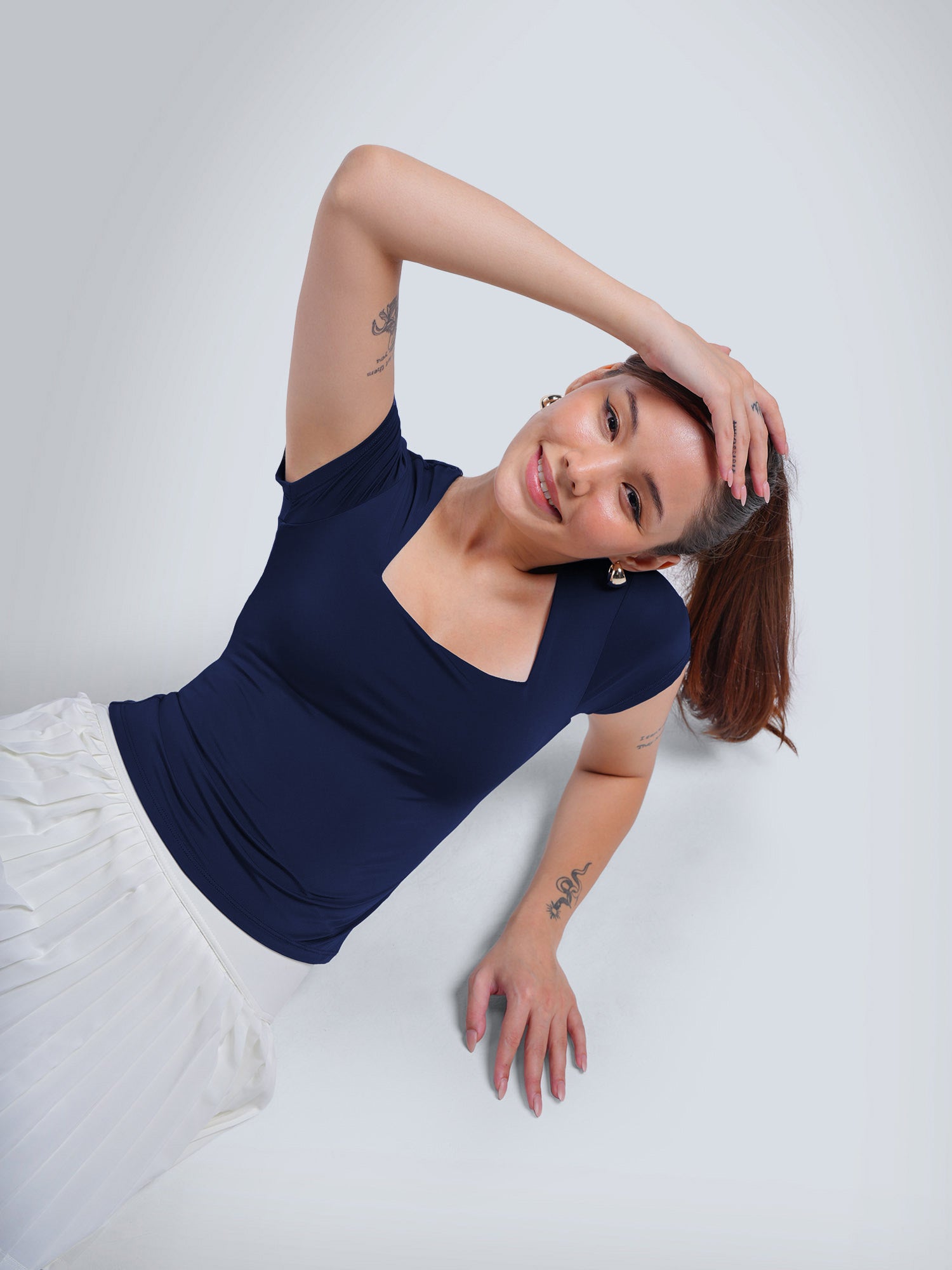 Navy Sculpt Built-In Top – CAVA Athleisure Pvt Ltd